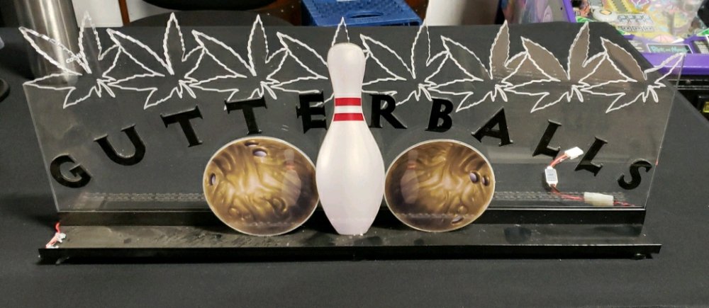 1 LOT- BIG LEBOWSKI PINBALL TOPPER (GUTTERBALLS)