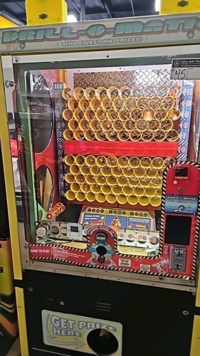 DRILL-O-MATIC PRIZE VENDING ARCADE GAME BENCHMARK