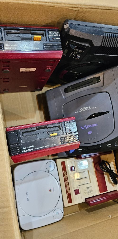 1 BOX LOT MISC. CONSOLES PS1,FAMICOM DISK DRIVES x2, VIctor Saturn ...